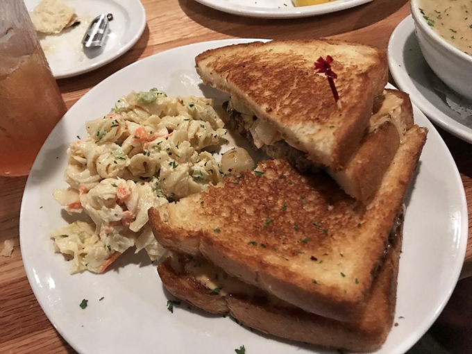 A grilled sandwich that's achieved the perfect golden-brown tan, paired with a pasta salad that steals the show. Photo credit: Amber J.