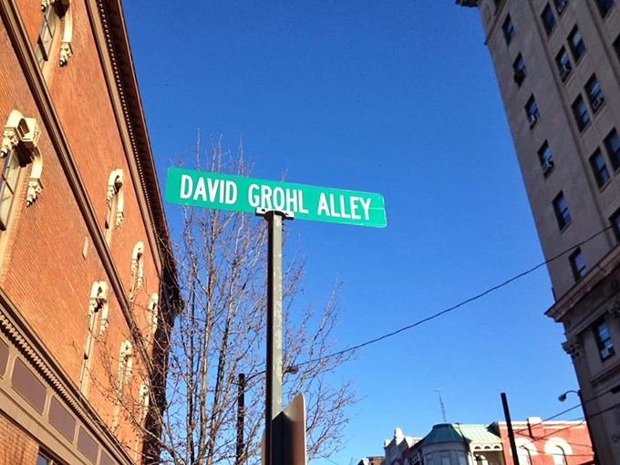 You are here: Rock City, USA! This street sign marks the spot where music history meets Midwest charm in perfect harmony.