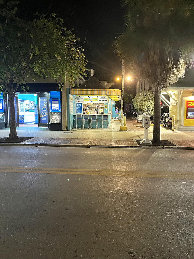 Nighttime noshing at its best! The Conch Shack glows like a beacon of hope for hungry night owls seeking seafood salvation.