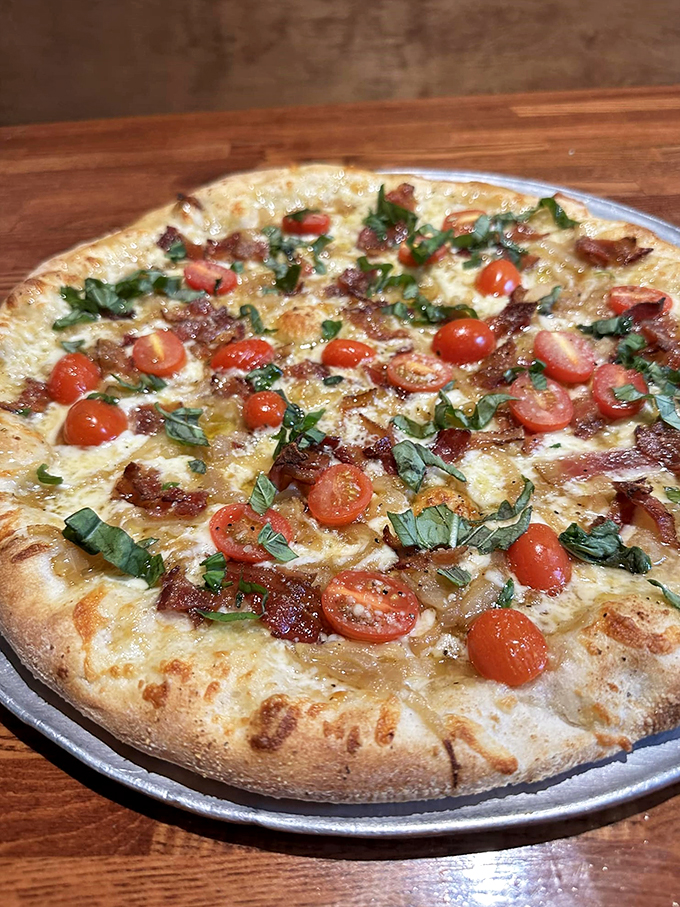 The Sugar House Pie: Where bacon meets maple in perfect harmony. It's so Vermont, it practically comes with its own flannel shirt.