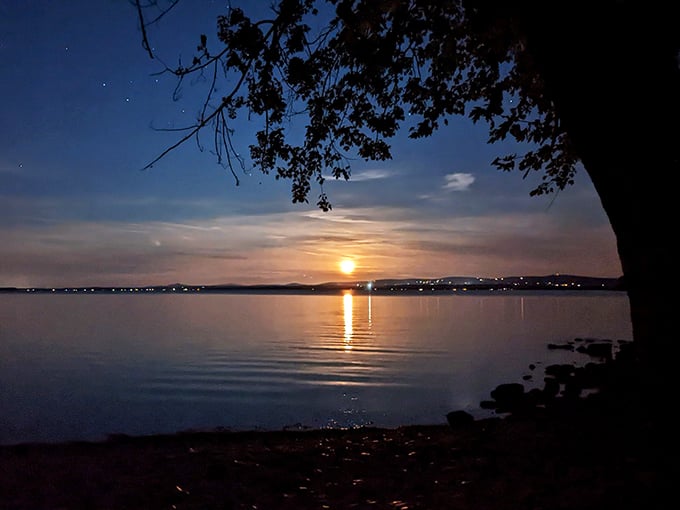 Sunset over Lake Champlain: Where day bids adieu in a blaze of glory. It's nature's way of saying, "Top that, Hollywood special effects!"