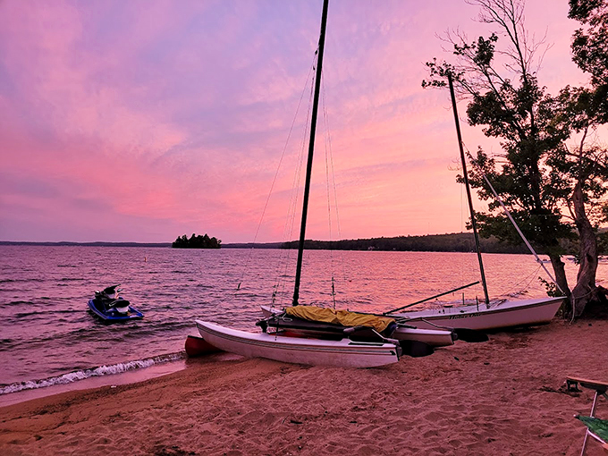 Cotton candy skies paint the perfect ending to a Maine day, with sailboats resting peacefully on rose-tinted waters.