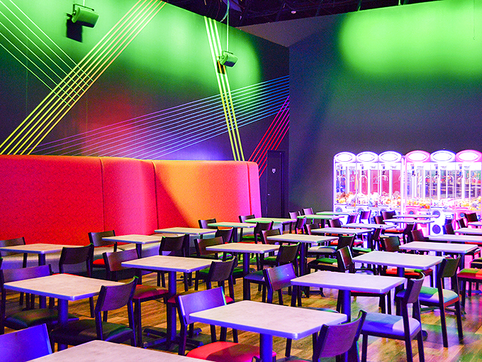 Neon dreams and arcade schemes! This dining area is the perfect spot to refuel between gaming marathons. Photo credit: Jake's Unlimited