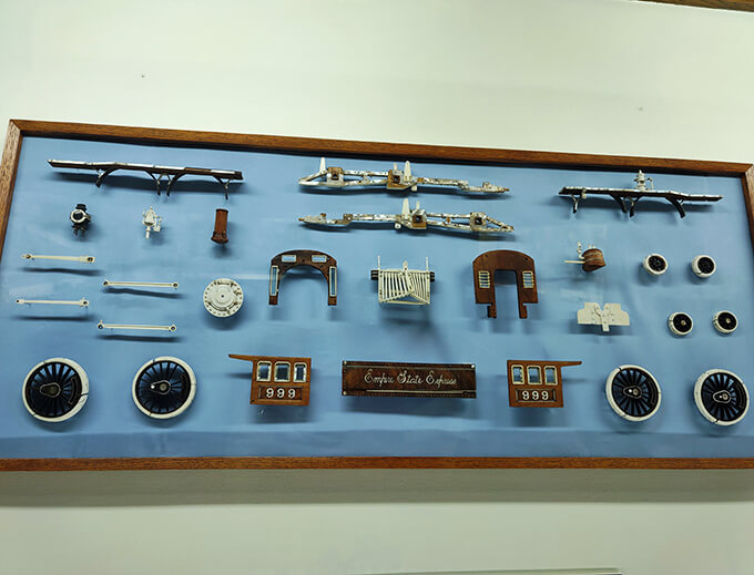 A symphony of steam and wood. This deconstructed display shows the building blocks of Warther's locomotive love affair.