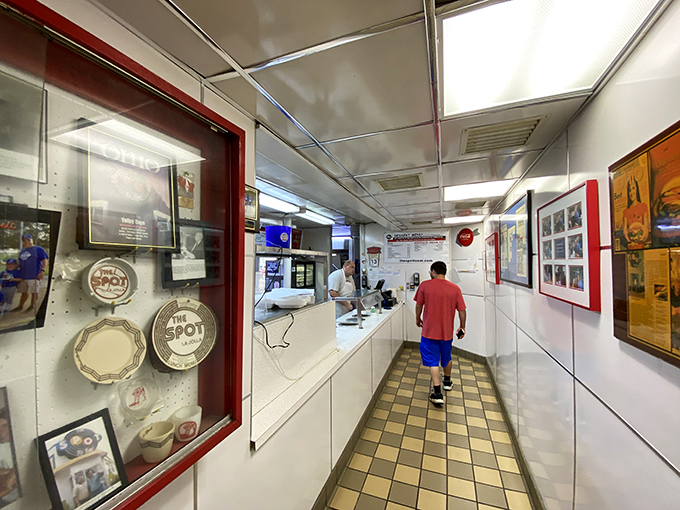 If these walls could talk, they'd probably ask for seconds. The Spot's decor is a scrapbook of memories, served with a side of local pride.