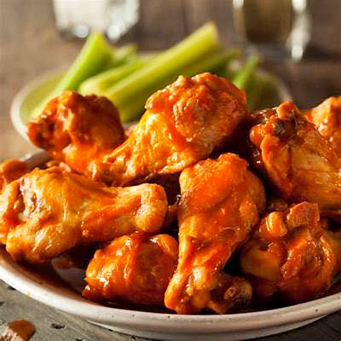 Wings so good, they'll make you consider growing your own feathers. Finger-licking perfection on a plate!
