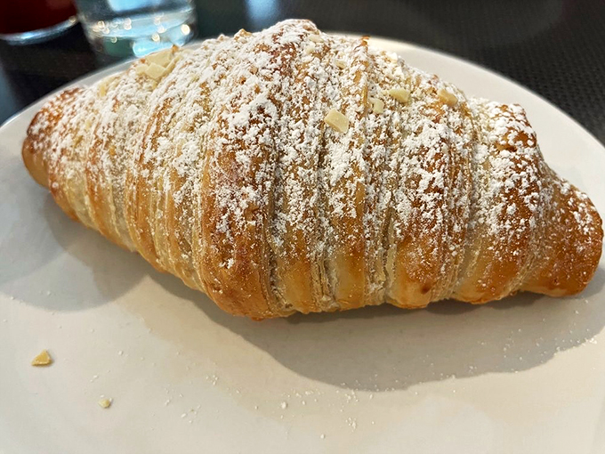 An almond croissant so divine, it might just make you believe in breakfast magic. Flaky, buttery bliss awaits.