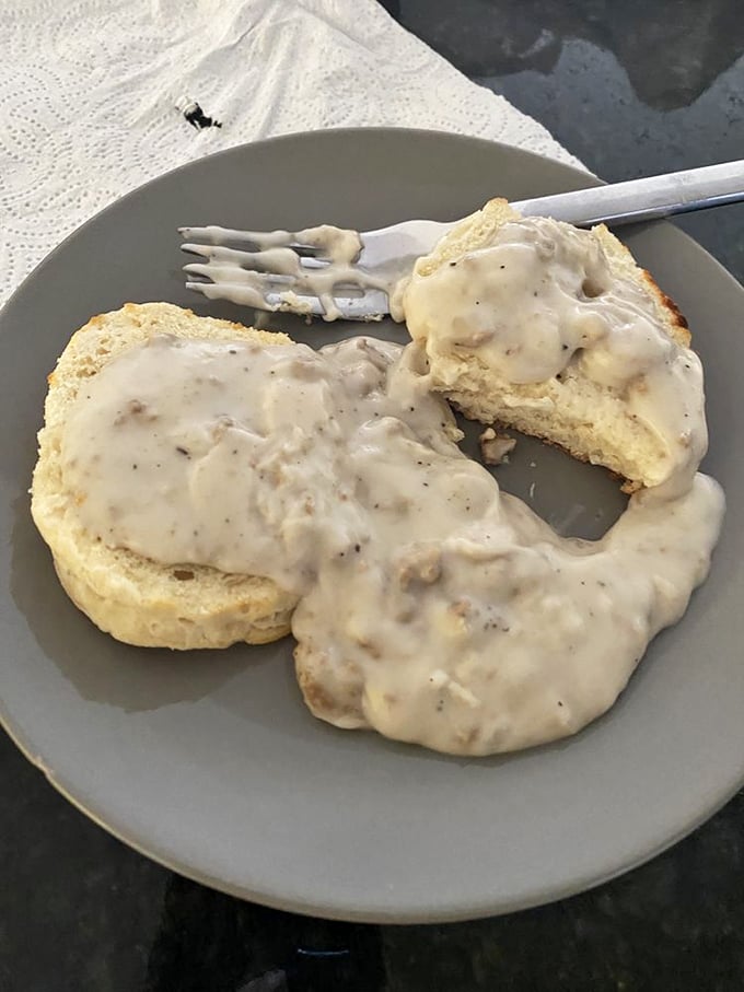 Biscuits and gravy: the breakfast of champions! This plate is comfort food incarnate, ready to hug your taste buds and your soul.
