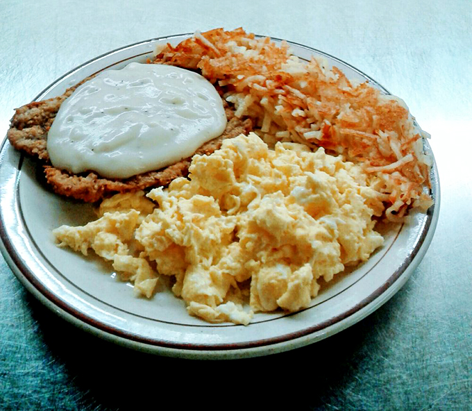 A breakfast plate that hits all the right notes! From fluffy eggs to crispy hash browns, it's a symphony of flavors that'll make your taste buds dance. Photo credit: Talulah M.