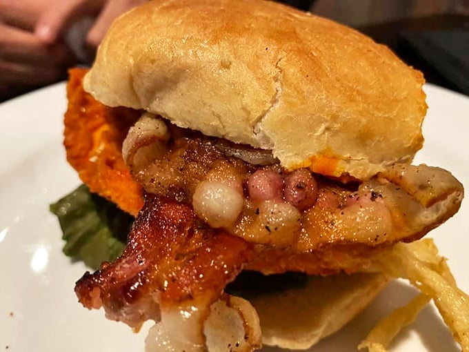 Hold onto your buns! This burger's got more layers than a soap opera plot twist. It's a handful of happiness. Photo credit: Emad Maksimous