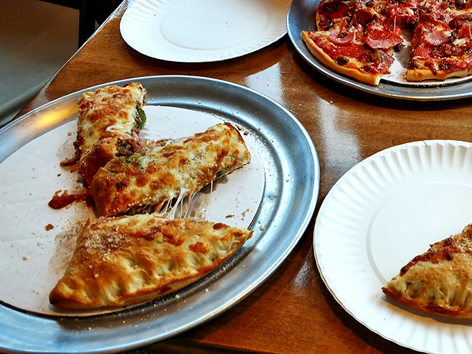 Calzone or work of art? These stuffed beauties are like edible treasure chests, just waiting to spill their cheesy secrets.