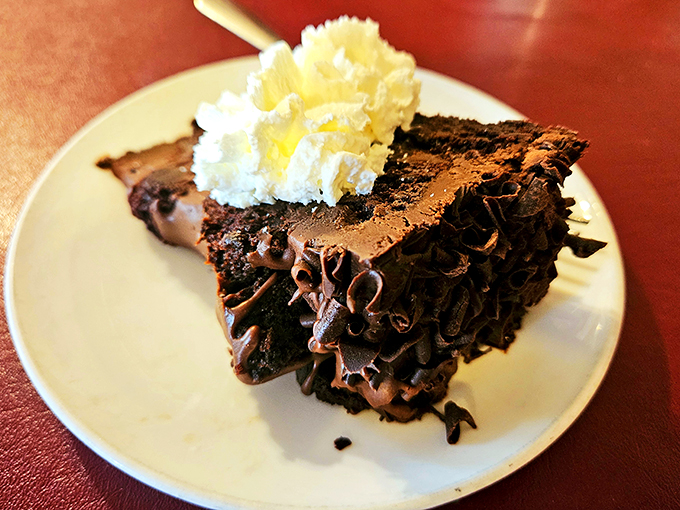 Chocolate lovers, rejoice! This slice of heaven is darker than a film noir and twice as thrilling. Save room for dessert? Challenge accepted!