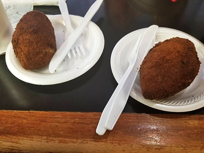 Deviled crabs so devilishly good, they might make an angel consider switching sides. Crispy, savory, and utterly addictive. Photo credit: Manolo Hernandez