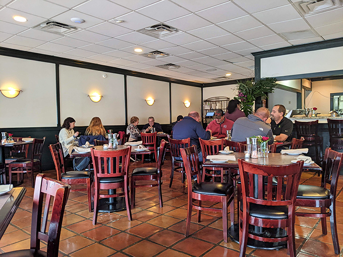 The heart of Michael's Grill. This bustling dining area is where food dreams come true and strangers become friends over shared culinary delights. Photo credit: yves merienne