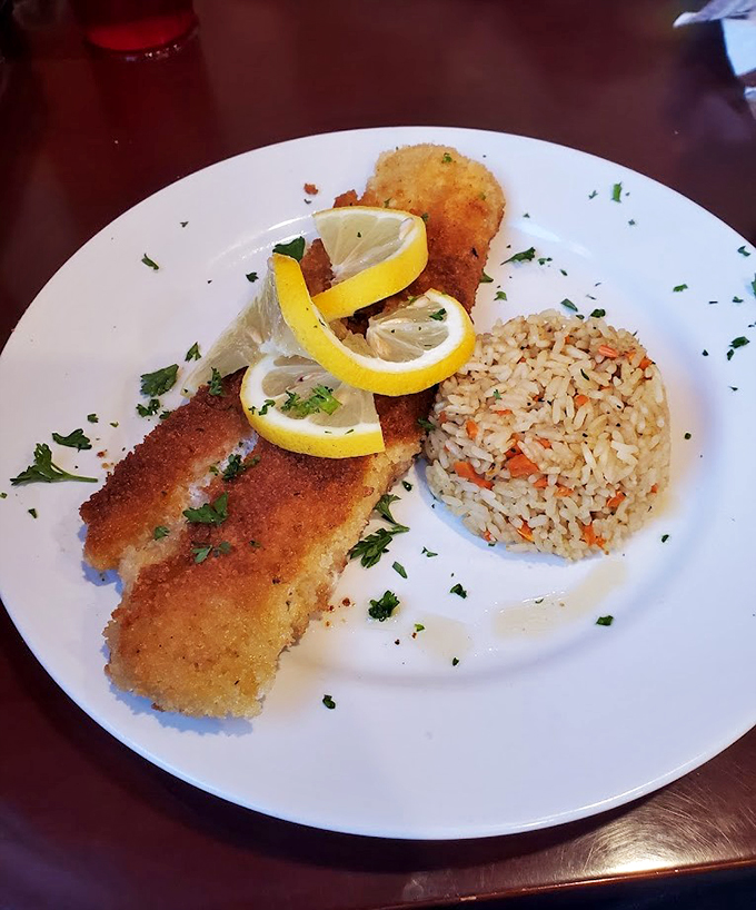 This fish fry is so golden and crispy, it could make Captain Ahab forget all about that white whale. The lemon wedges are standing by for their supporting role!