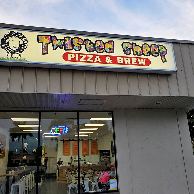 The sign says "Open," but your stomach says "Hurry up and get in there!" This colorful welcome is like a beacon of hope for hungry souls. Photo credit: C7sunshine