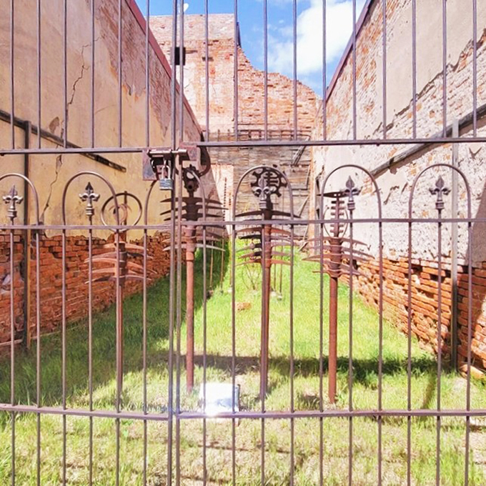 Art meets decay in Jerome's forgotten corners. These rusty gates guard secrets as old as the town itself.