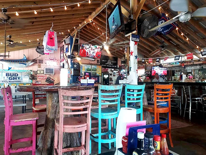 Step into seafood central. With its vibrant decor and laid-back vibe, this interior screams "coastal casual" in the best way possible.