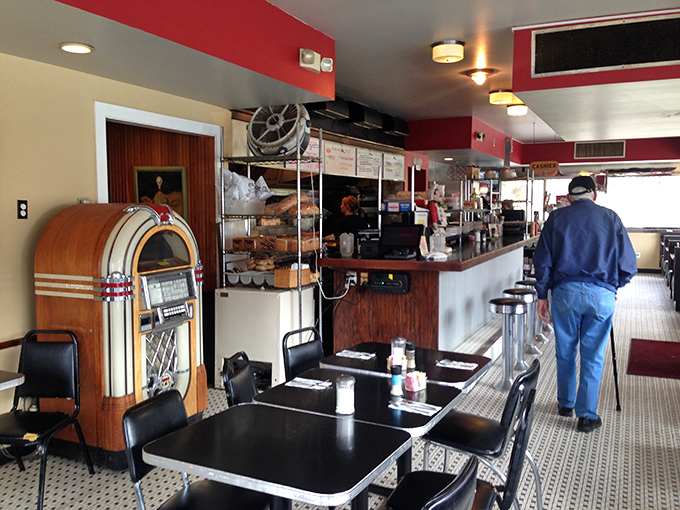 A jukebox that's seen more hits than a boxing match. Pick your tune and let the nostalgia wash over you like a wave of warm maple syrup.