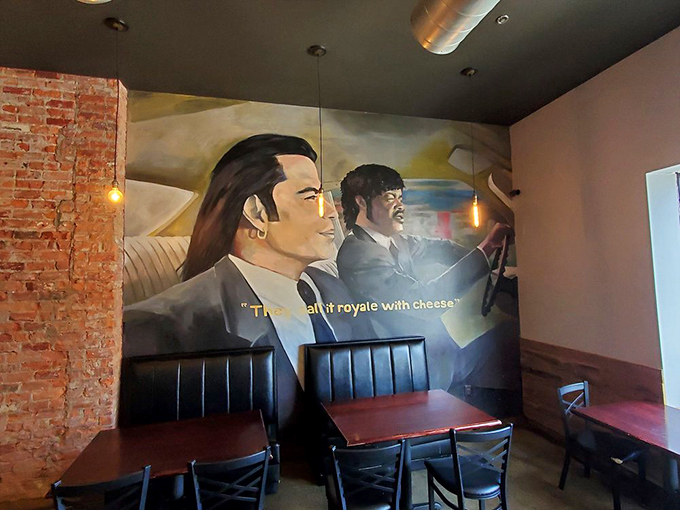 "They call it royale with cheese." This mural isn't just decoration; it's a conversation starter that comes with free refills of movie quotes.