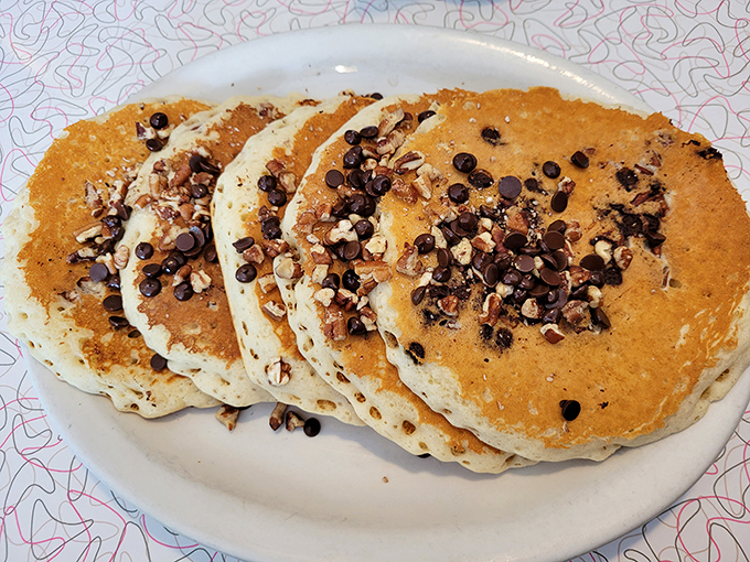 Pancakes so perfect, they make you question why you ever eat anything else. Each bite is like a fluffy, syrup-soaked cloud of happiness.