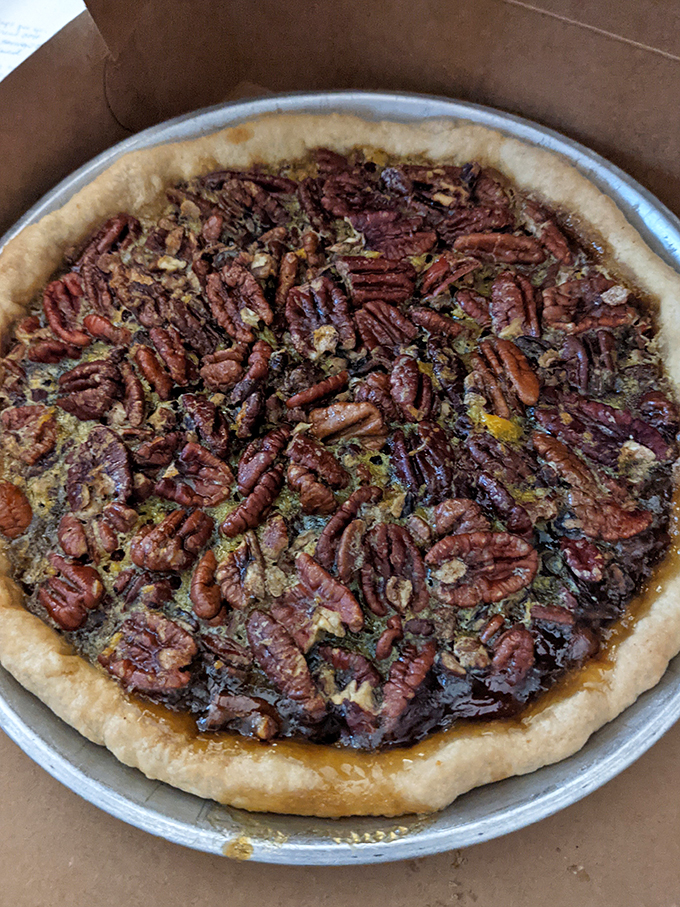 Holy pecan! This pie looks like it could make even the toughest nut crack a smile. It's not just dessert, it's a slice of heaven.