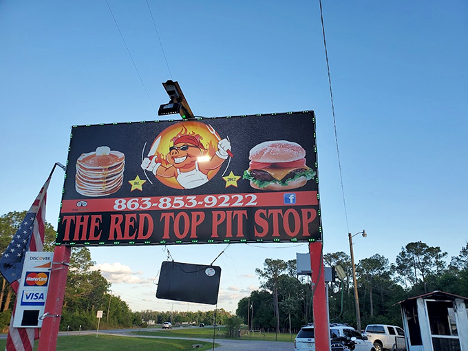 Neon dreams and comfort food schemes! This sign is like a beacon of hope for empty stomachs everywhere.