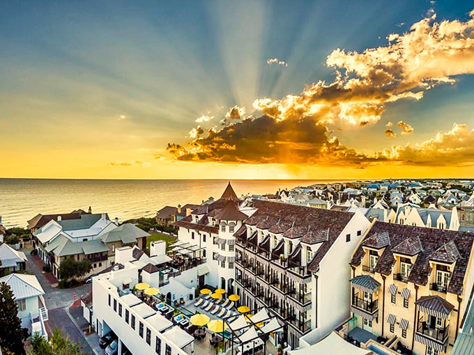 A golden sunset paints the sky, transforming Rosemary Beach's distinctive architecture into silhouettes worthy of a watercolor masterpiece.