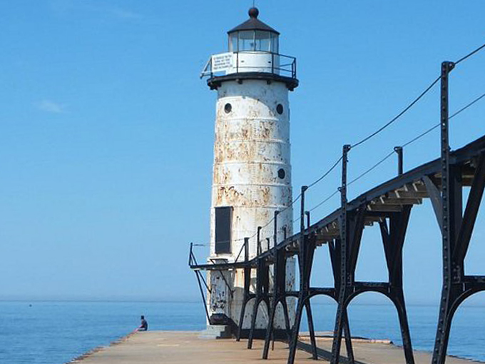 Riverwalk revelry in Manistee! The town's scenic pathway offers a perfect blend of nature and nostalgia, no time machine required.