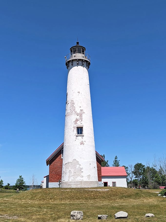 Cloud-kissed and sun-blessed, Tawas Point Lighthouse stands tall. It's the Great Lakes' answer to the Eiffel Tower, minus the French accent. 