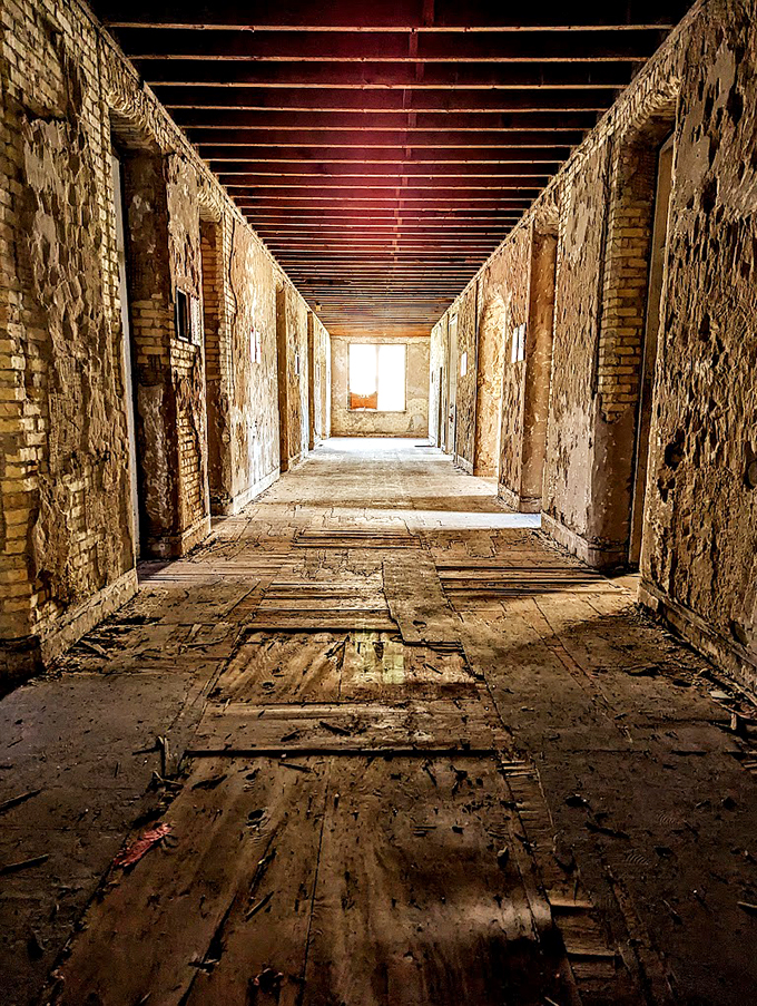 Eerie echoes of the past: This haunting hallway at Traverse City State Hospital whispers tales of forgotten souls.