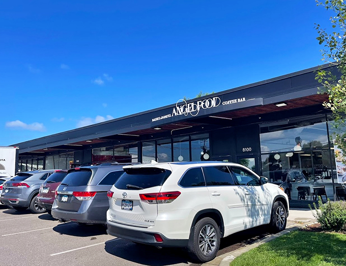 Heaven's outpost on Earth! This sleek black exterior hides a world of sugary delights that'll make your taste buds sing hallelujah.