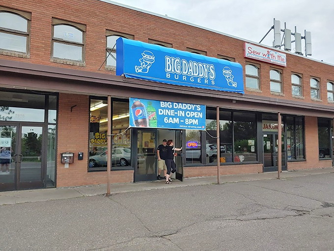 Welcome to burger paradise! Big Daddy's blue awning beckons like a beacon of hope for empty stomachs and weary souls. 
