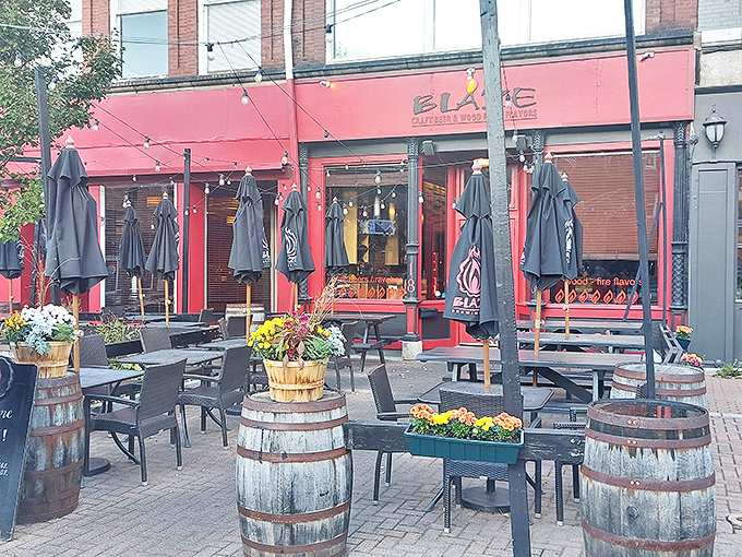 Blaze Bangor: Where the outdoor seating is so inviting, you might forget you're here to eat. Flower barrels and string lights? It's like a garden party, but with better pizza.
