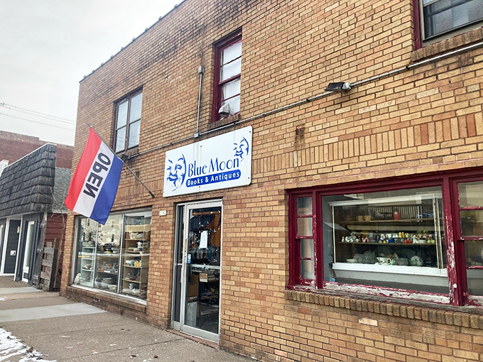 Step into this literary time machine! Blue Moon's brick facade and eclectic window display promise a journey through the pages of history.