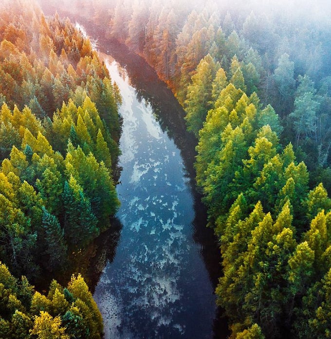 Kitch-iti-kipi: Nature's own infinity pool! This emerald oasis is like Mother Earth's screensaver come to life. Photo credit: @glennleerobinson