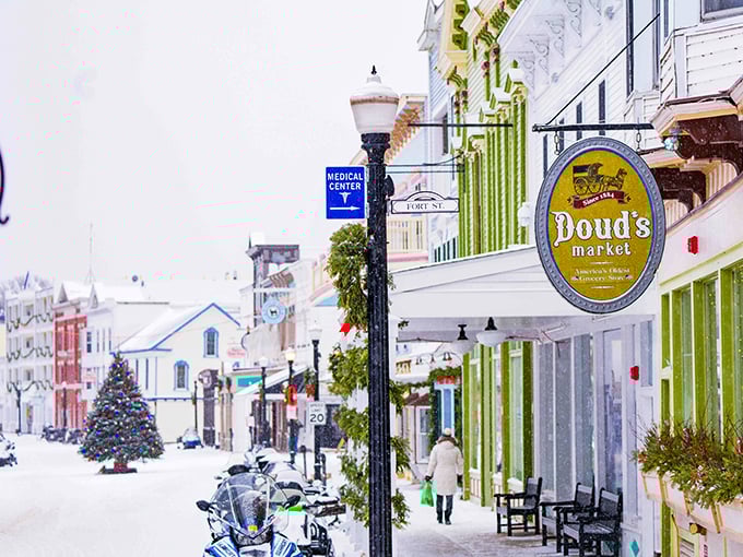 Main Street Mackinac in winter: where horse-drawn sleighs replace taxis and Doud's Market beckons with old-world charm.