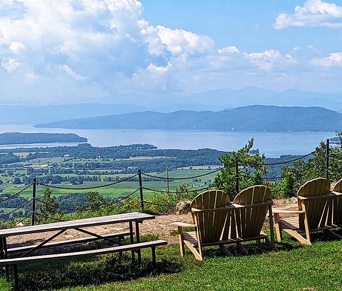 Nature's VIP lounge: Adirondack chairs with a view that'll make you forget your Netflix queue.
