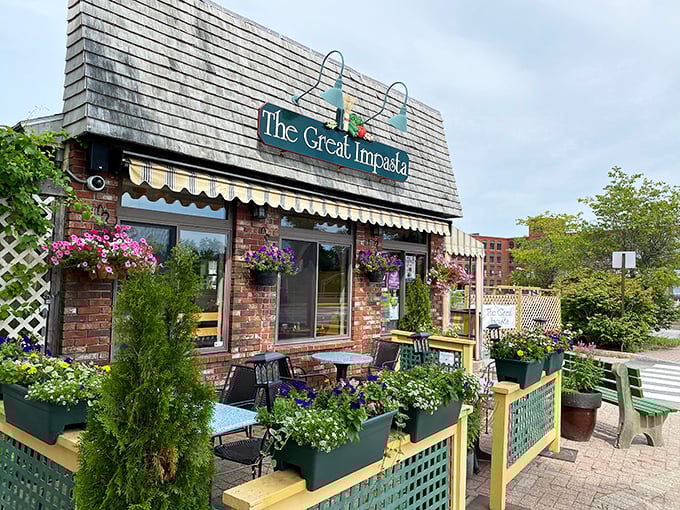 The Great Impasta: Where flowers bloom and pasta dreams come true. This charming facade promises carb-loaded delights that'll make your taste buds sing.