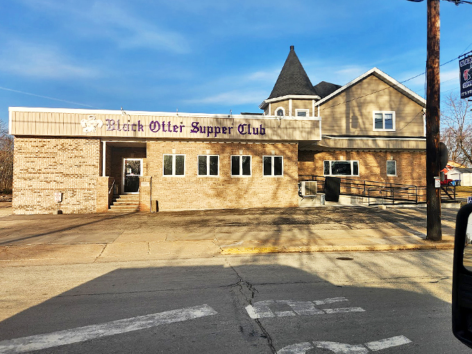 That vintage supper club signage against the bright blue sky - like a beacon calling hungry souls home. 