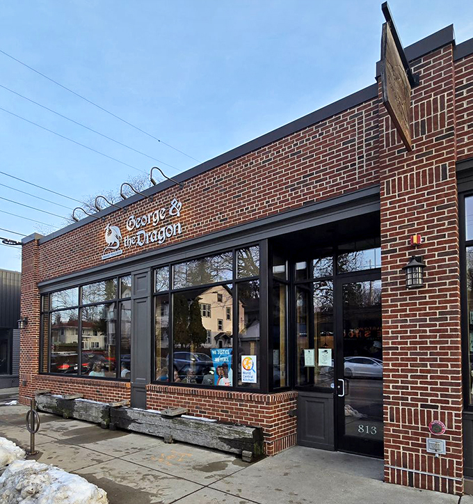 Where dragons are slain by pints! This charming pub's facade promises a warm welcome and cold brews within. Photo credit: Todd B.