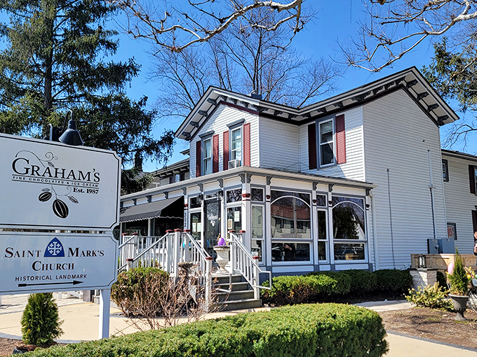 Red-and-white awning alert! Graham's beckons like a candy-striped lighthouse, guiding sugar-seekers to confectionery bliss.