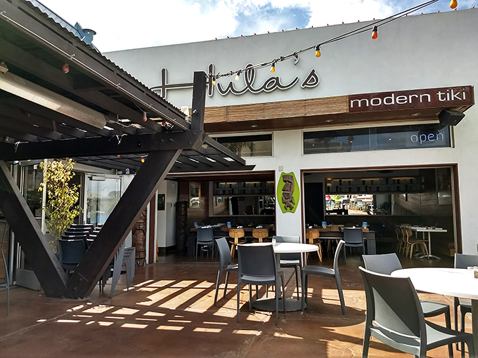 Hula's patio: The perfect spot to sip a Mai Tai and pretend you're in Waikiki. Just don't try to surf on the tables – trust me on this one.