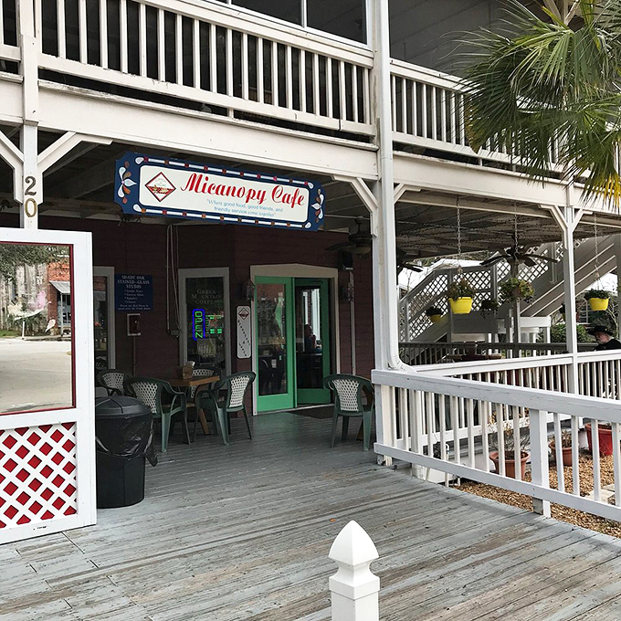 The Micanopy Cafe's white-railed porch invites you to sit a spell, like a scene from a novel about small-town secrets and sweet tea.