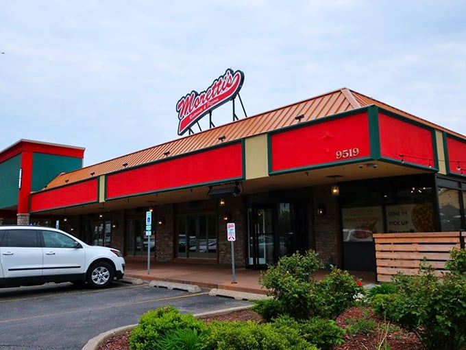 Forget the Bat-Signal, this glowing Moretti's sign is the real hero's call for pizza lovers everywhere.