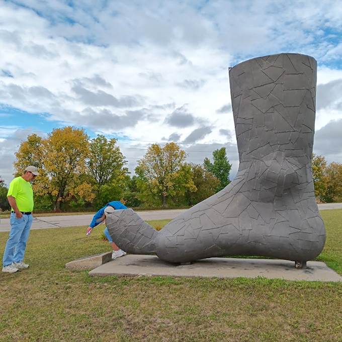 Holy footwear, Batman! This colossal boot could give Paul Bunyan a run for his money. Nyberg's sculptures redefine "putting your best foot forward."