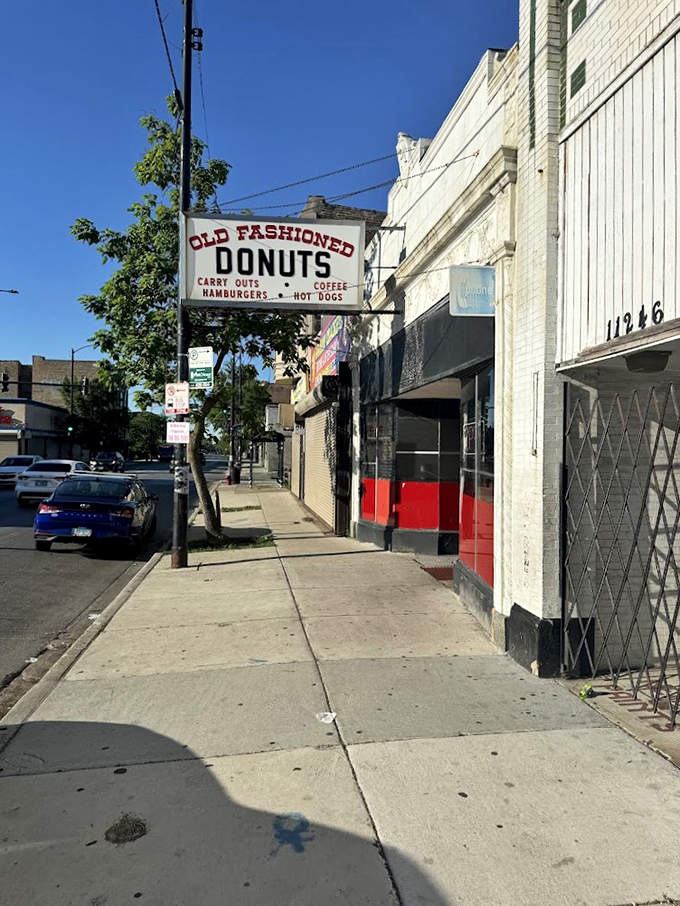 Retro charm meets modern cravings. This no-frills facade hides a treasure trove of fried dough delights waiting to be discovered.