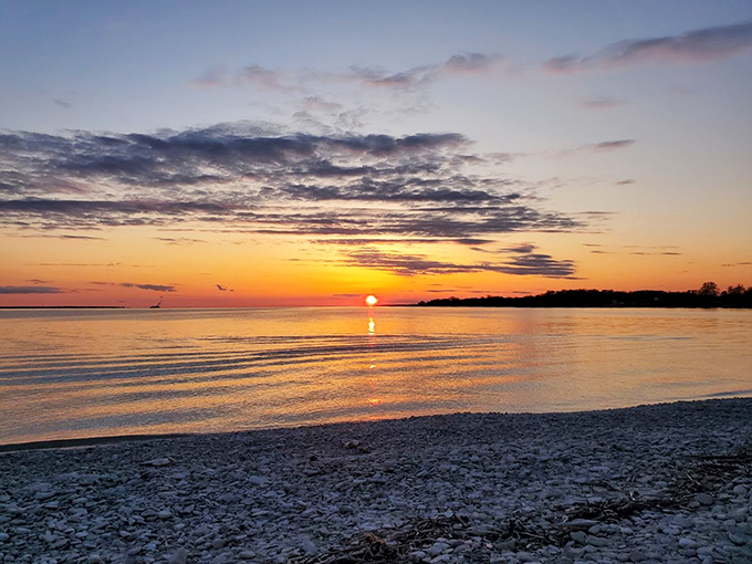 Rocky road, beach edition! This geological wonderland is like Mother Nature's own rock collection. Time to channel your inner pebble skipper!