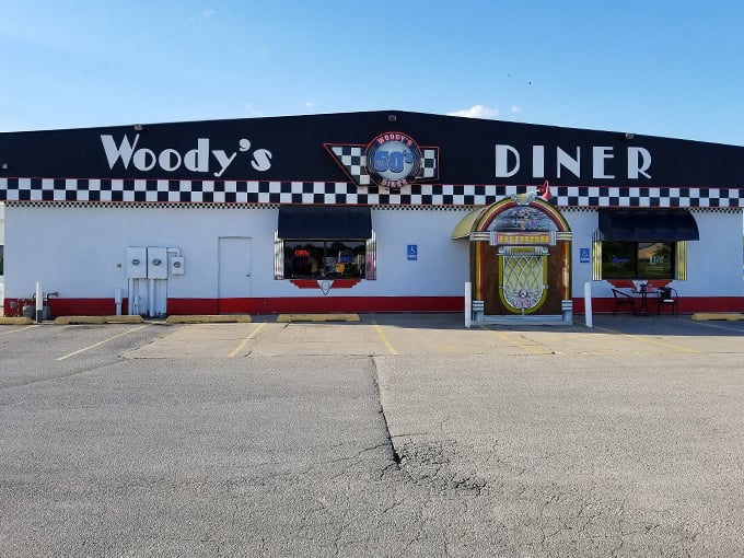 Forget DeLoreans, this diner's the real-time machine. Red and white awnings scream "I Love Lucy" era comfort food paradise. Photo credit: Woody's 50's Diner