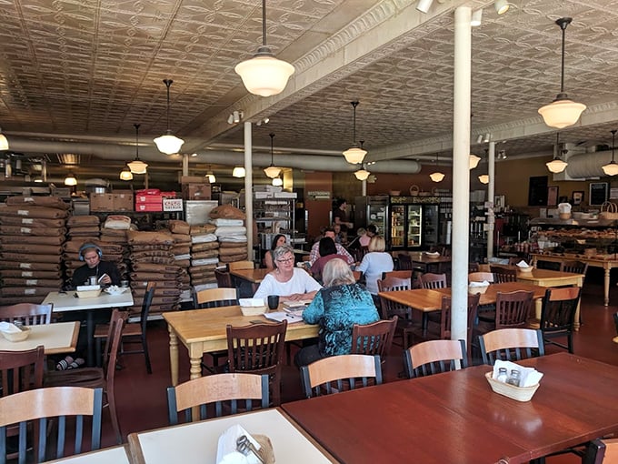 Bags of flour as decor? Genius! It's like they've turned the bakery inside out, and I'm here for it.